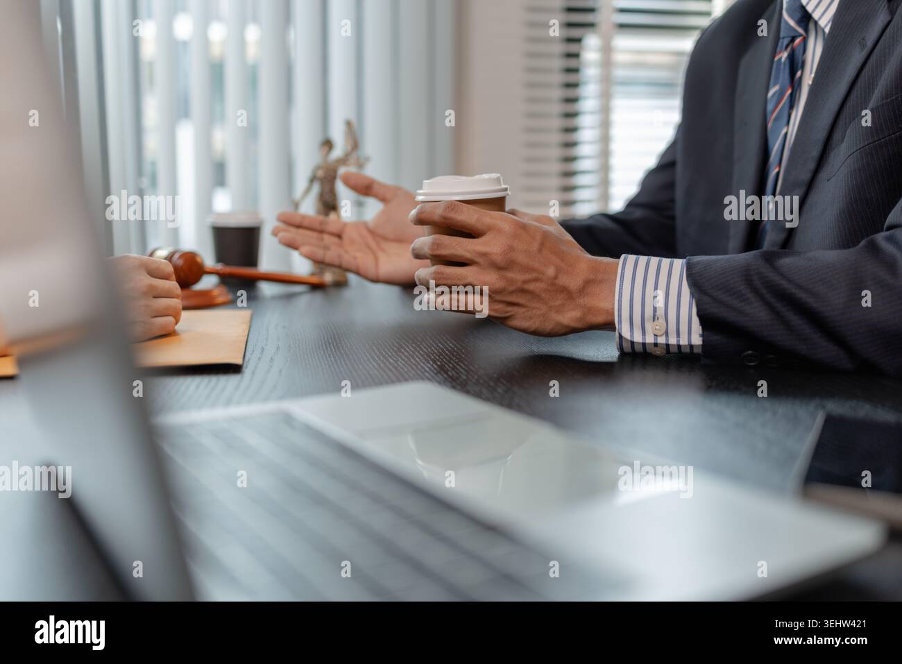 Professional legal consultation meeting between lawyer and client in ...