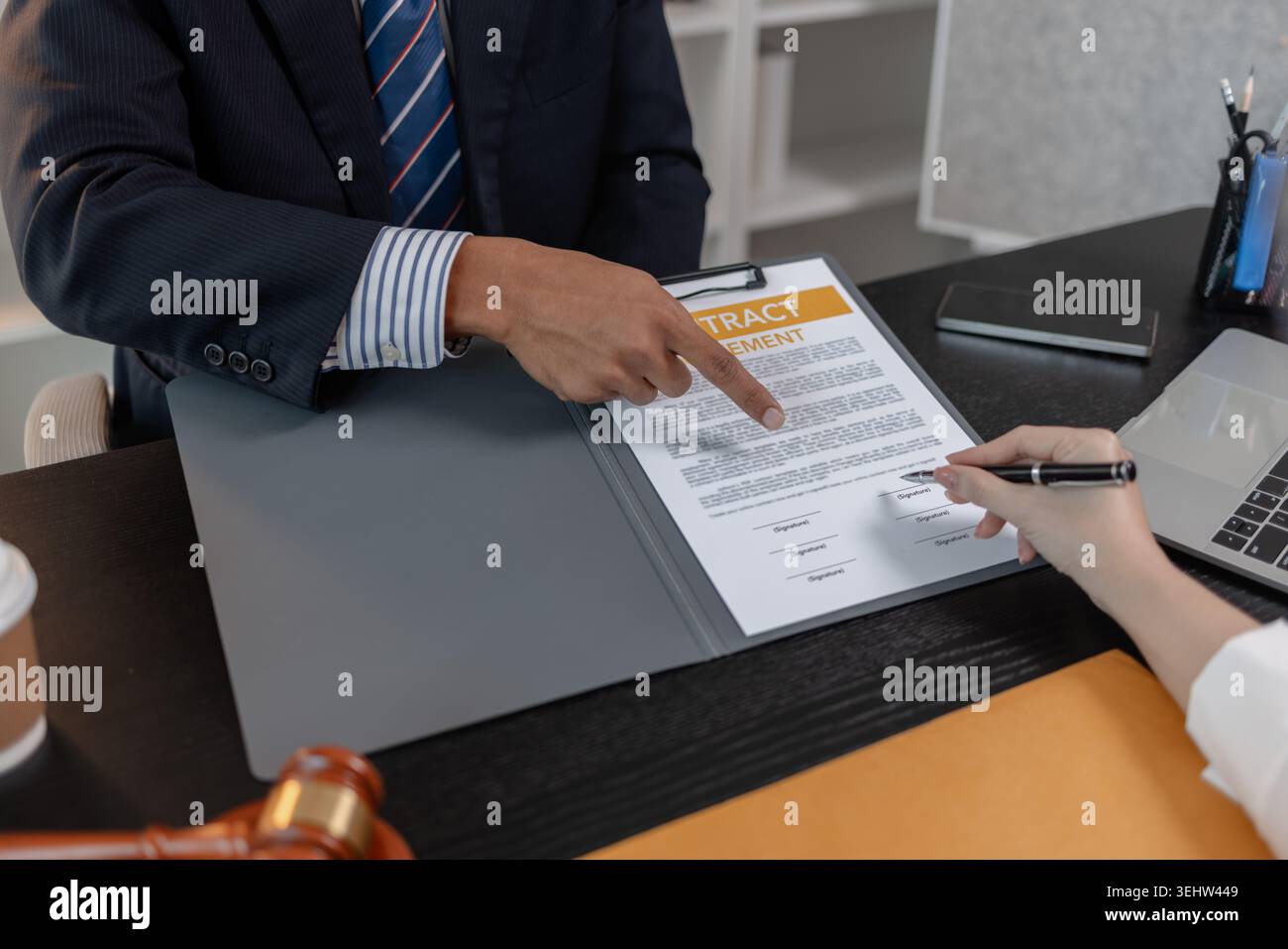 Professional legal consultation meeting between lawyer and client in ...