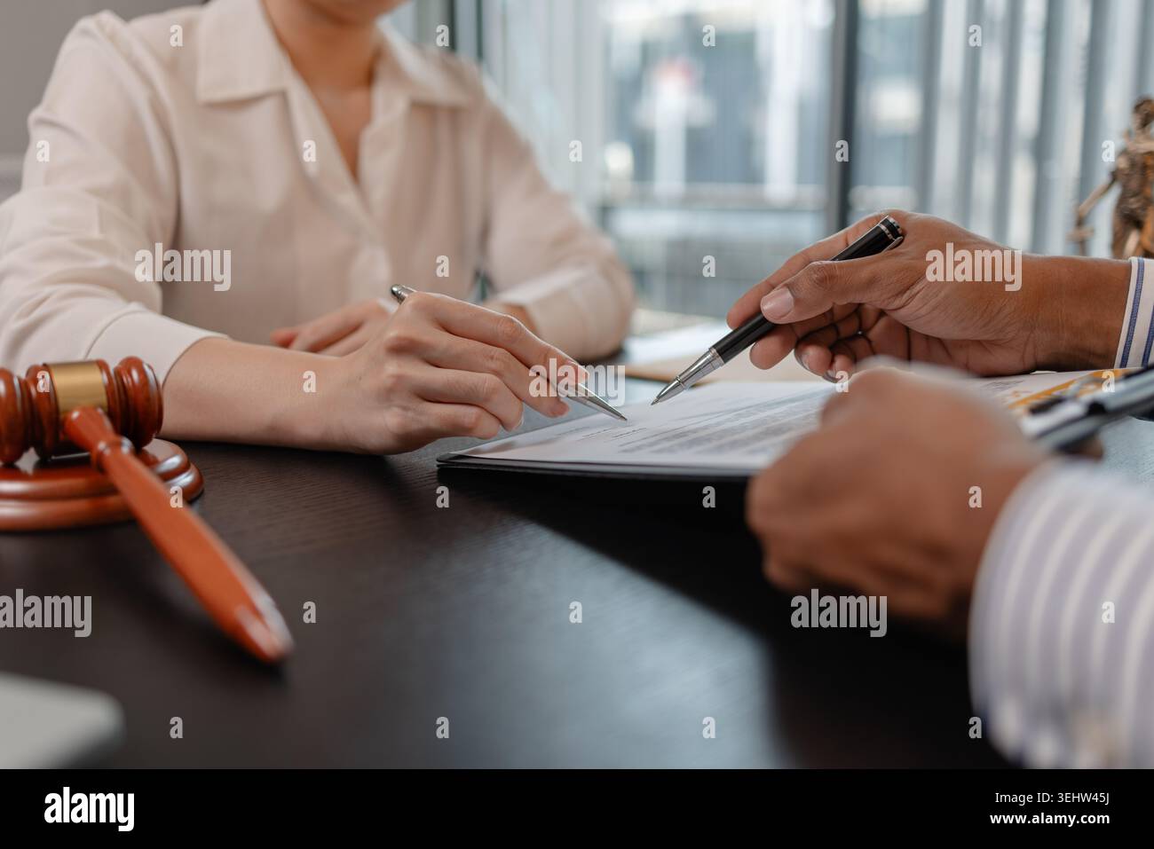 Professional legal consultation meeting between lawyer and client in ...