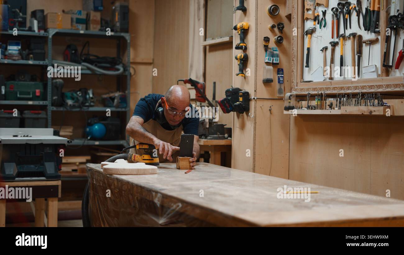 Wood artisan sanding wooden piece in workshop, crafting with skill ...