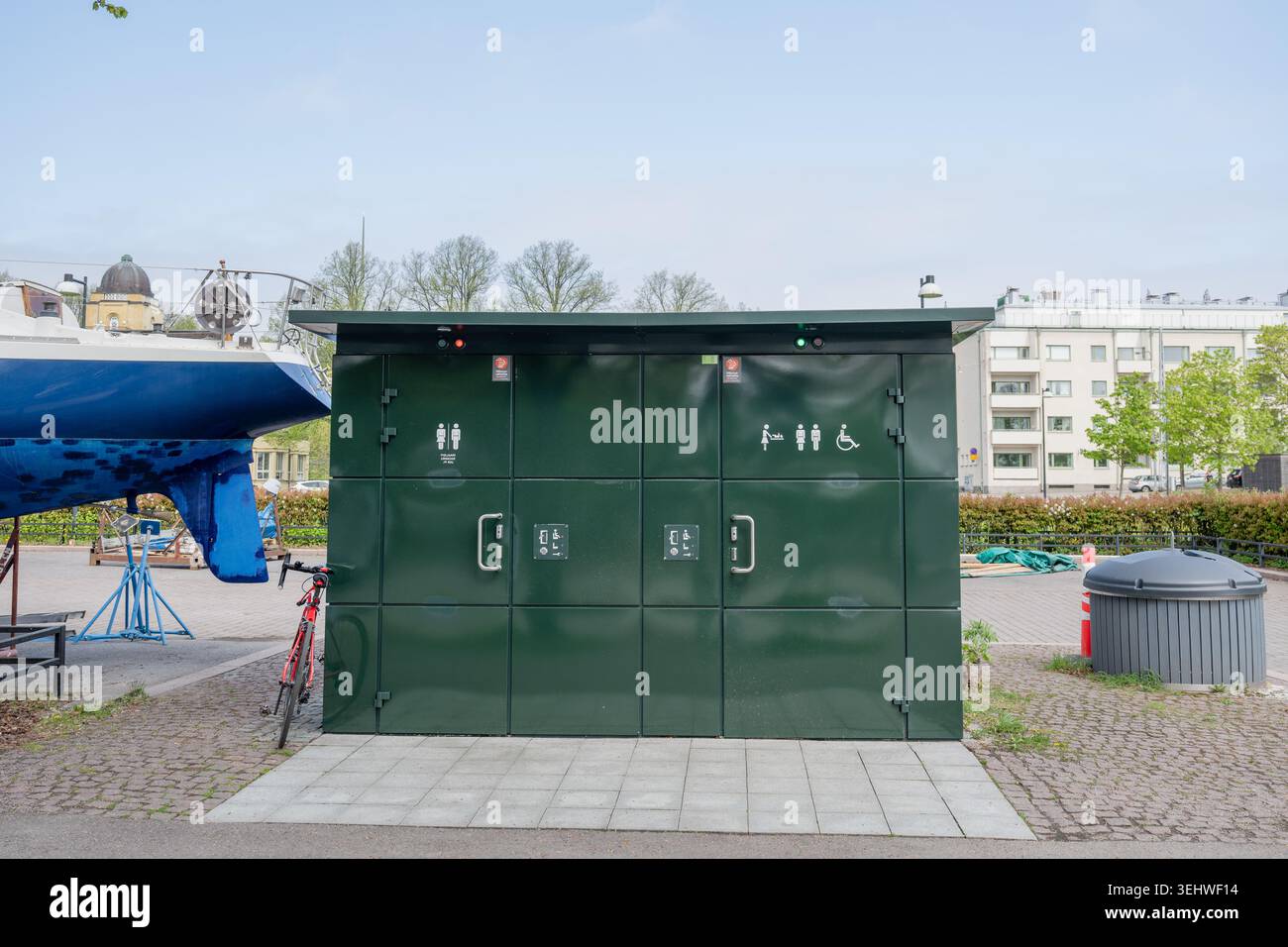 Modern public restroom facility near marina with urban infrastructure ...