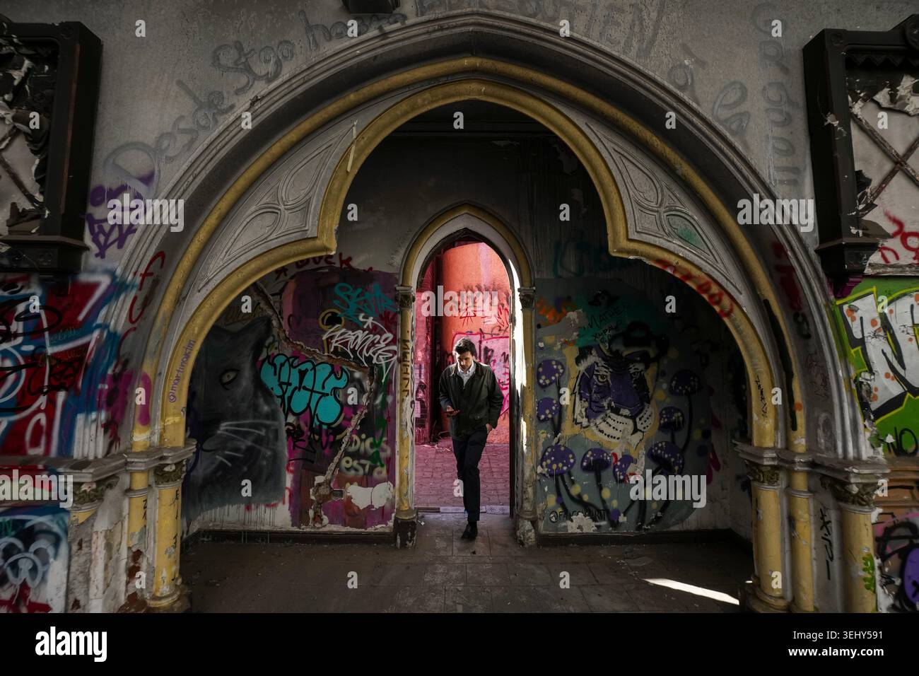 A man walk inside the neo-Gothic San Francisco de Borja church in ...