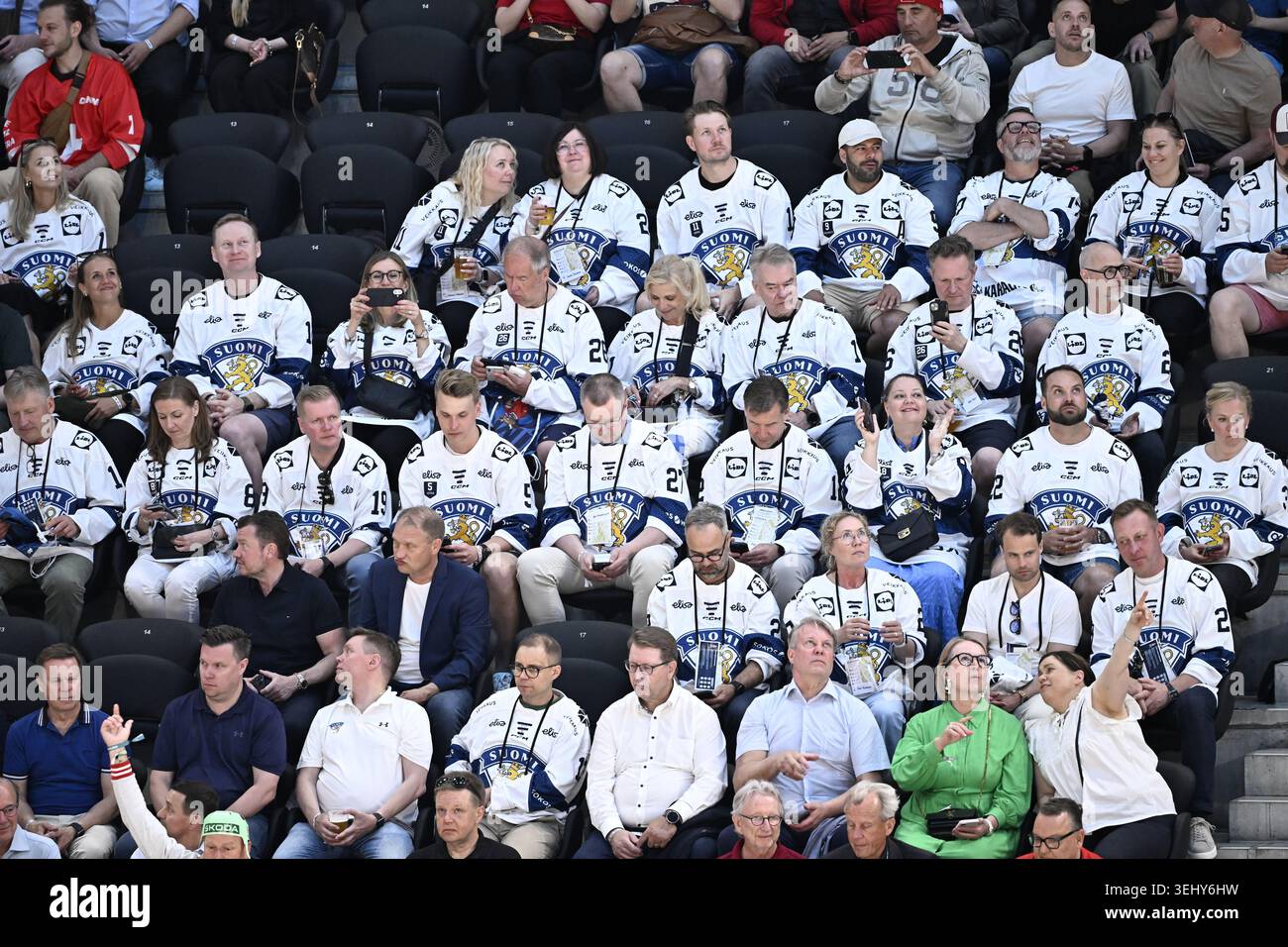 LKS 20260526 Finnish fans check their mobile phones ahead the 2026 IIHF ...