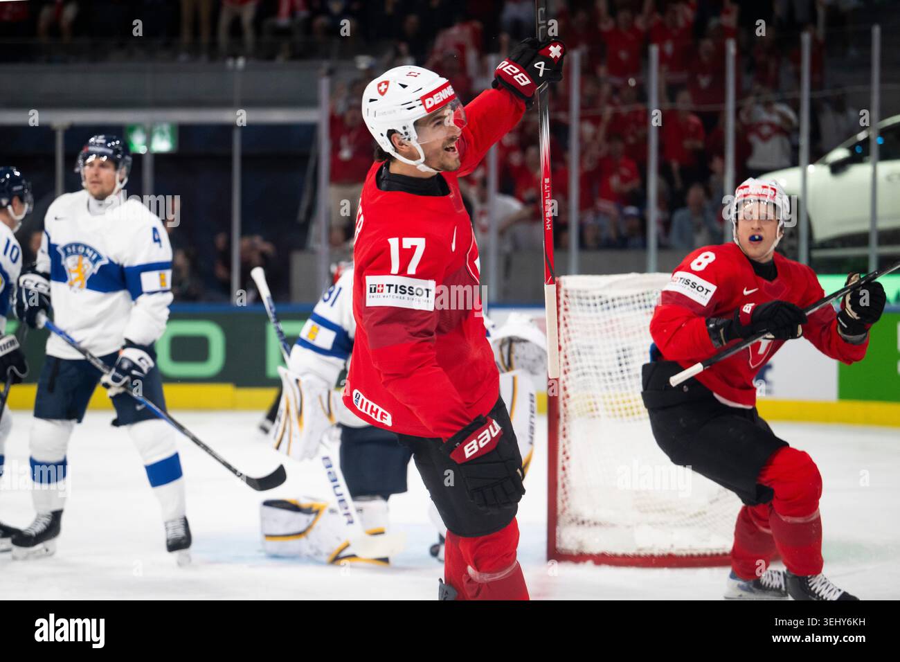 Switzerland's Ken Jager celebrates scoring during a preliminary round ...