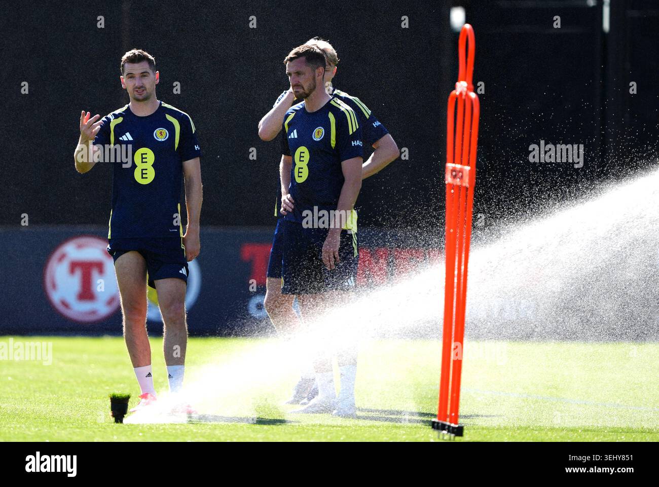 Scotland's Kenny McLean (left), Dominic Hyam and team-mate near a water ...