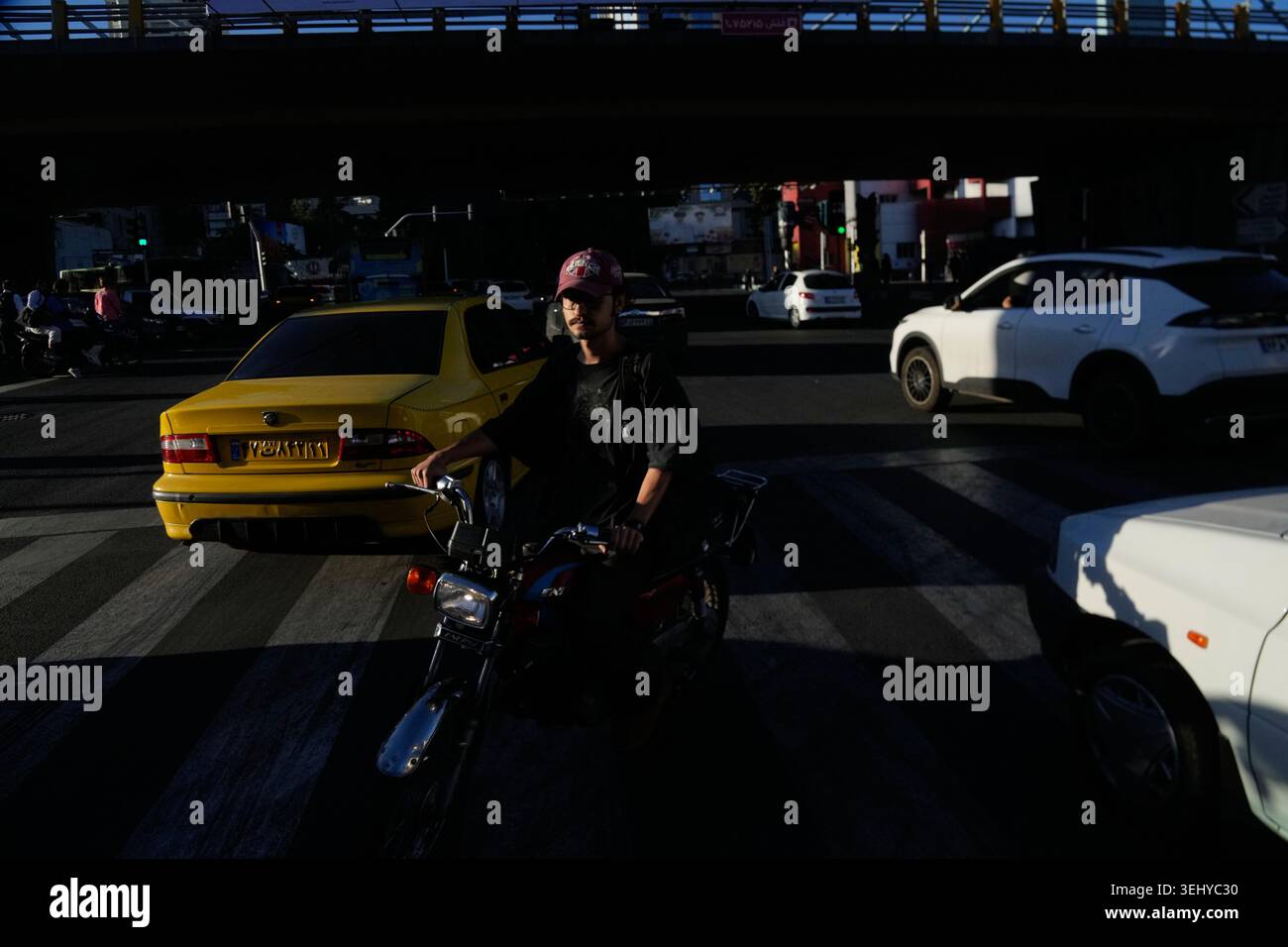 Vehicles cross an intersection in northern Tehran, Iran, Tuesday, May ...