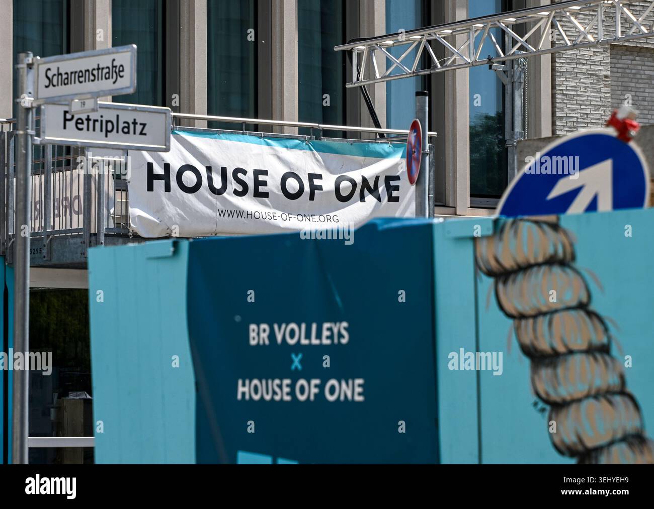26 May 2026, Berlin: A poster points to the "House of One" on ...