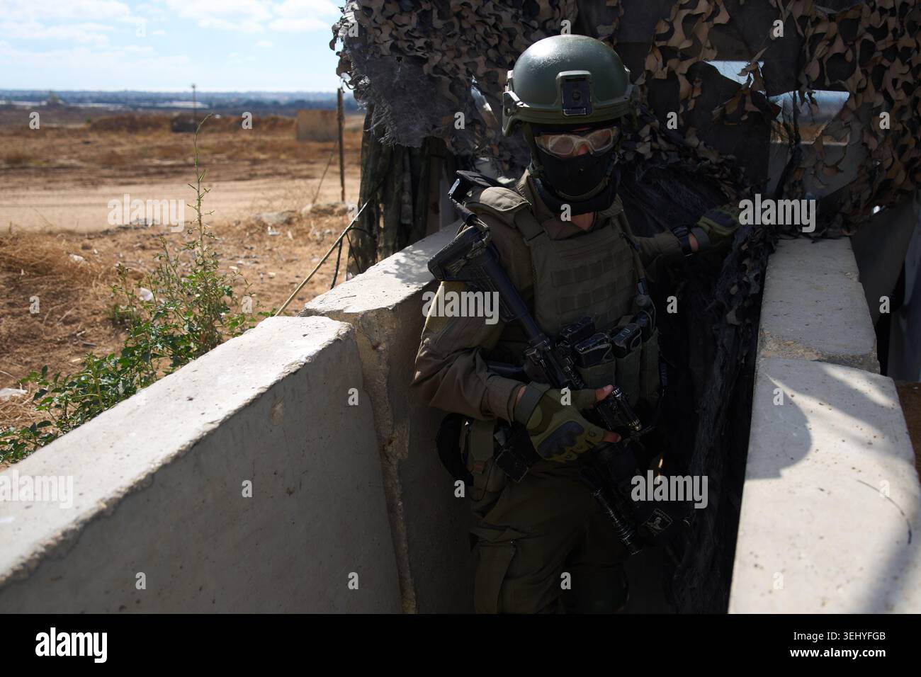 An Israeli soldier occupy a military position overlooking the so-called ...