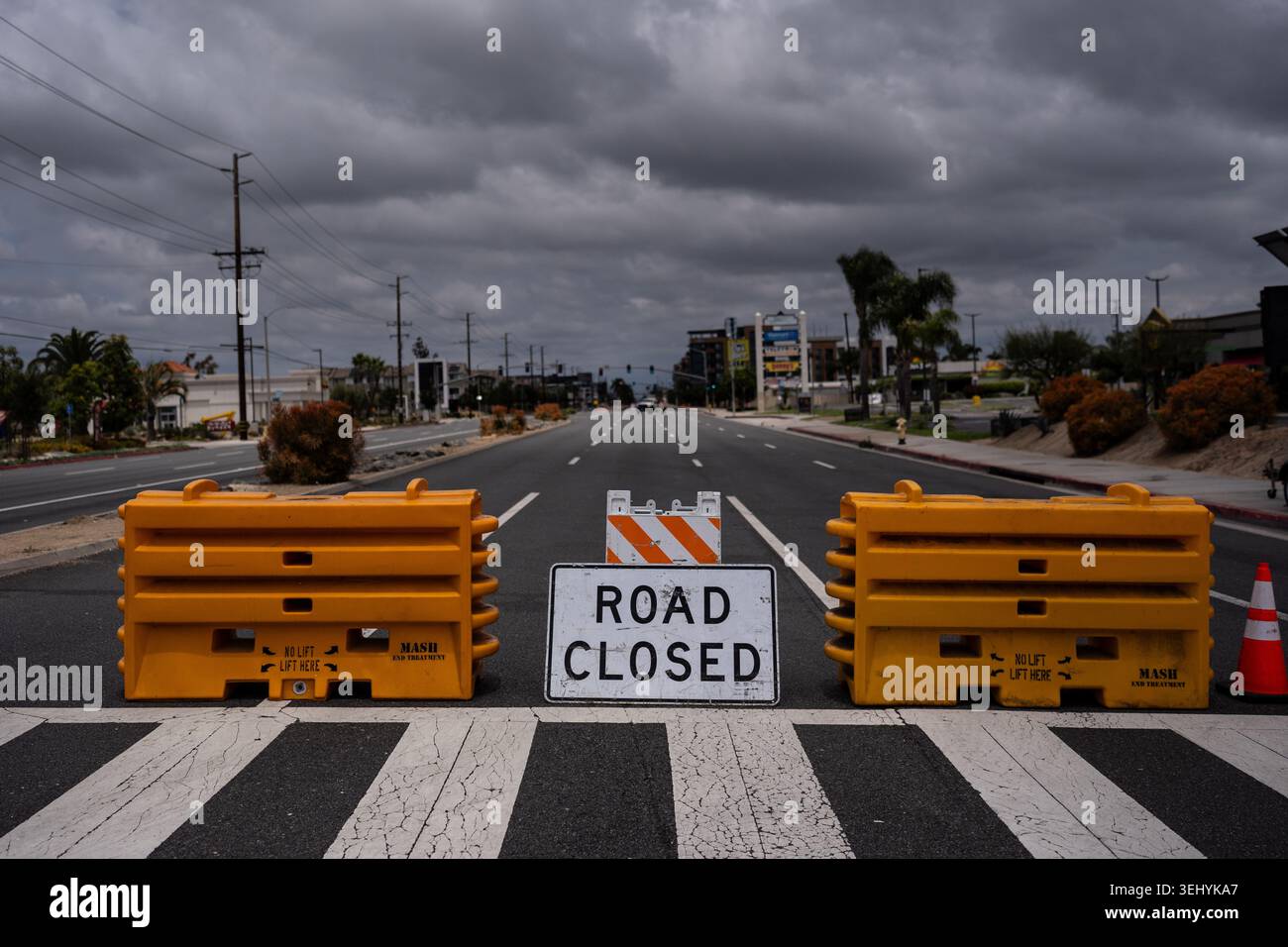 Barricades block a street in the evacuation zone in Garden Grove, Calif ...
