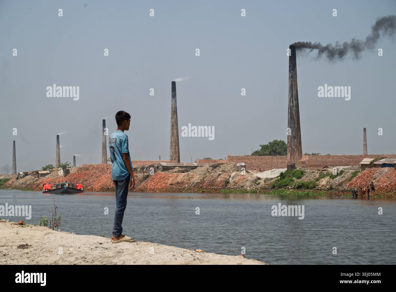 Narayanganj, Bangladesh - 12 April 2026: View of a young boy standing ...