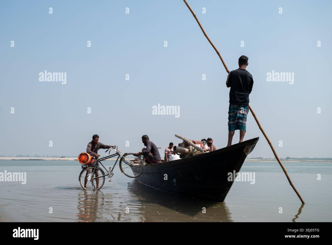 Gaibandha, Bangladesh - 15 February 2026: View of local men loading a ...