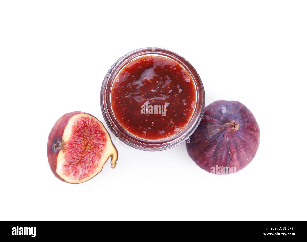 Glass jar with tasty fig jam isolated on white background, closeup ...