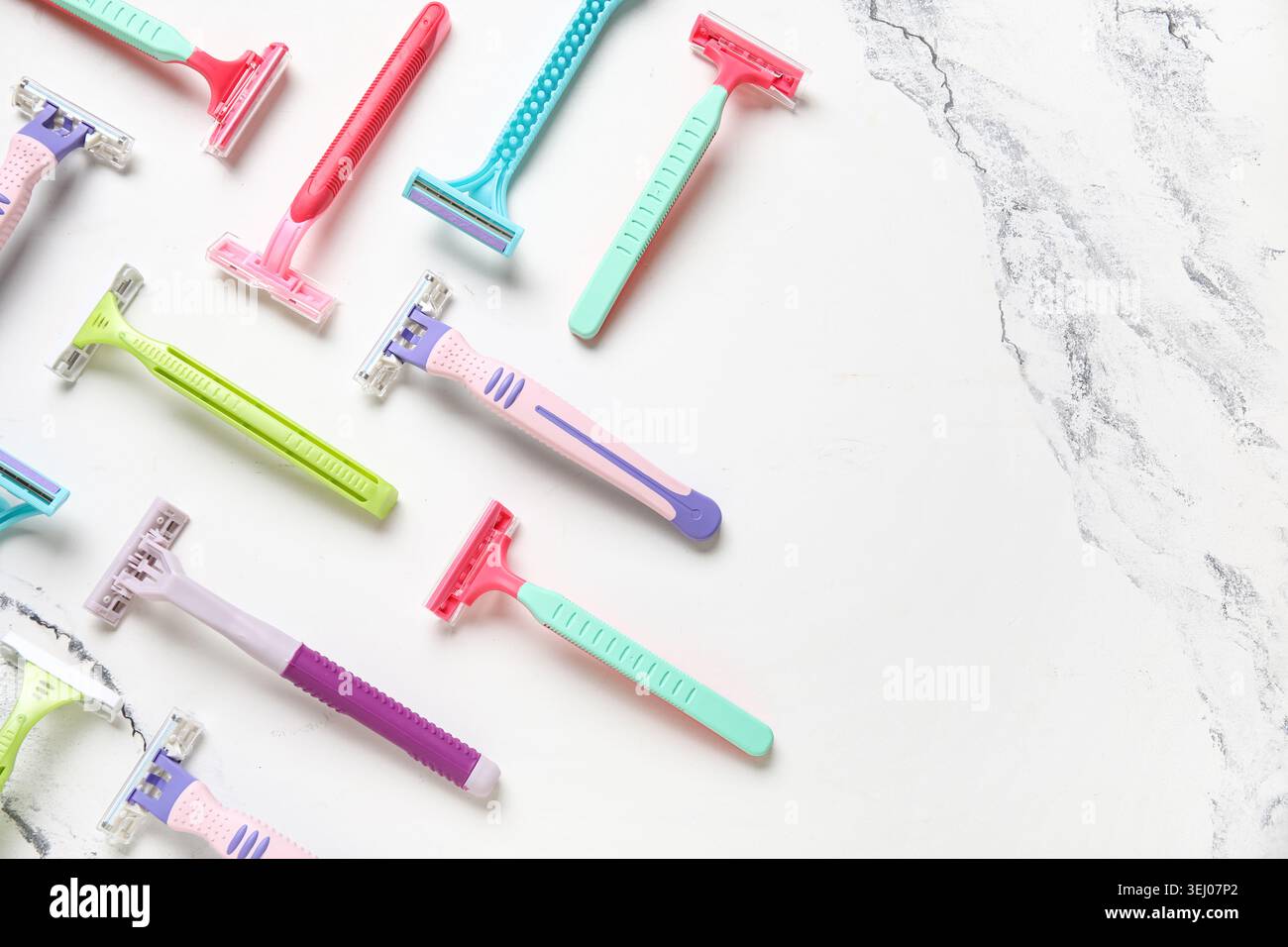 Composition with disposable shaving razors on marble background Stock ...