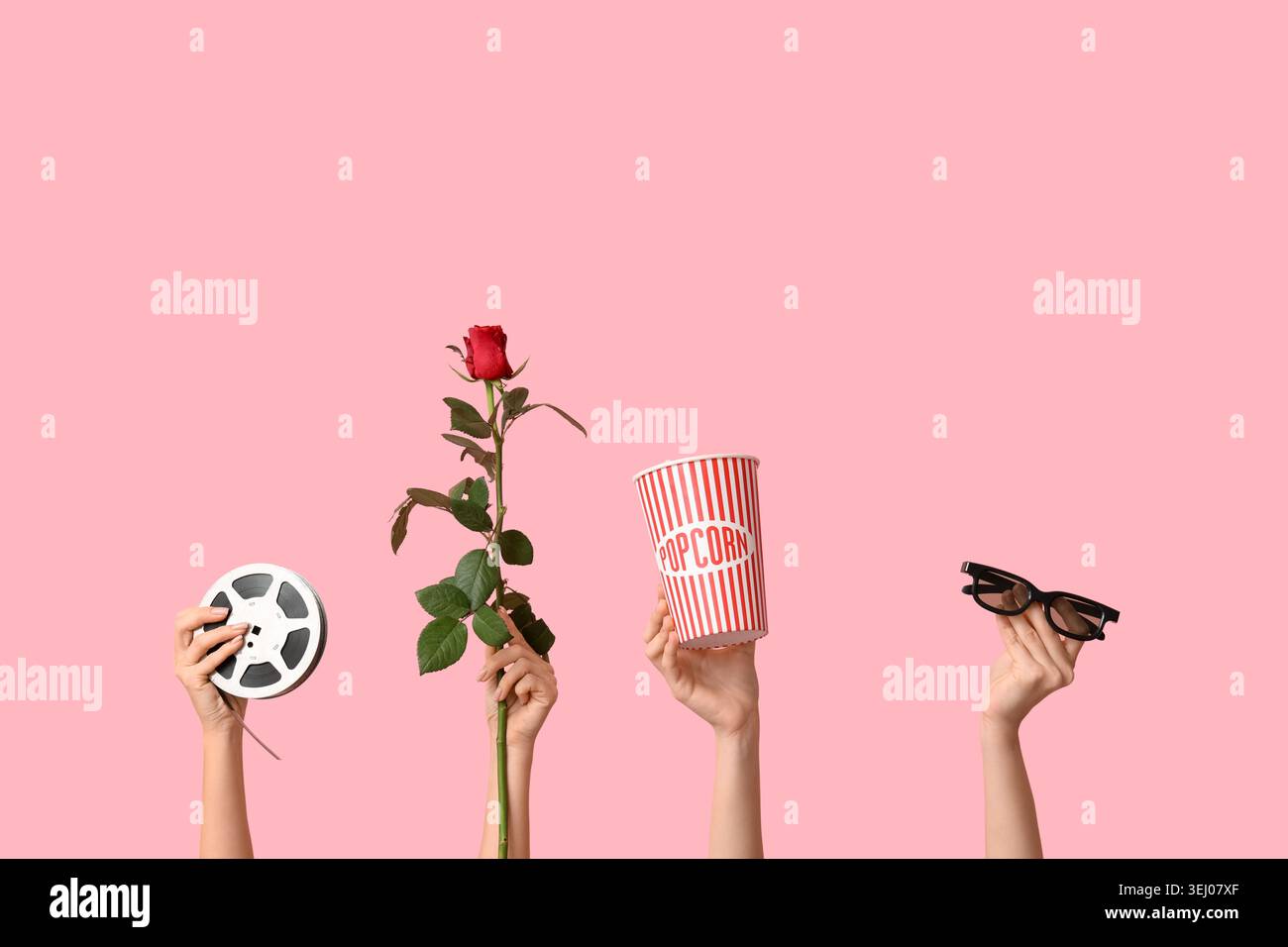 Female hands with film reel, rose flower, bucket of popcorn and 3D ...