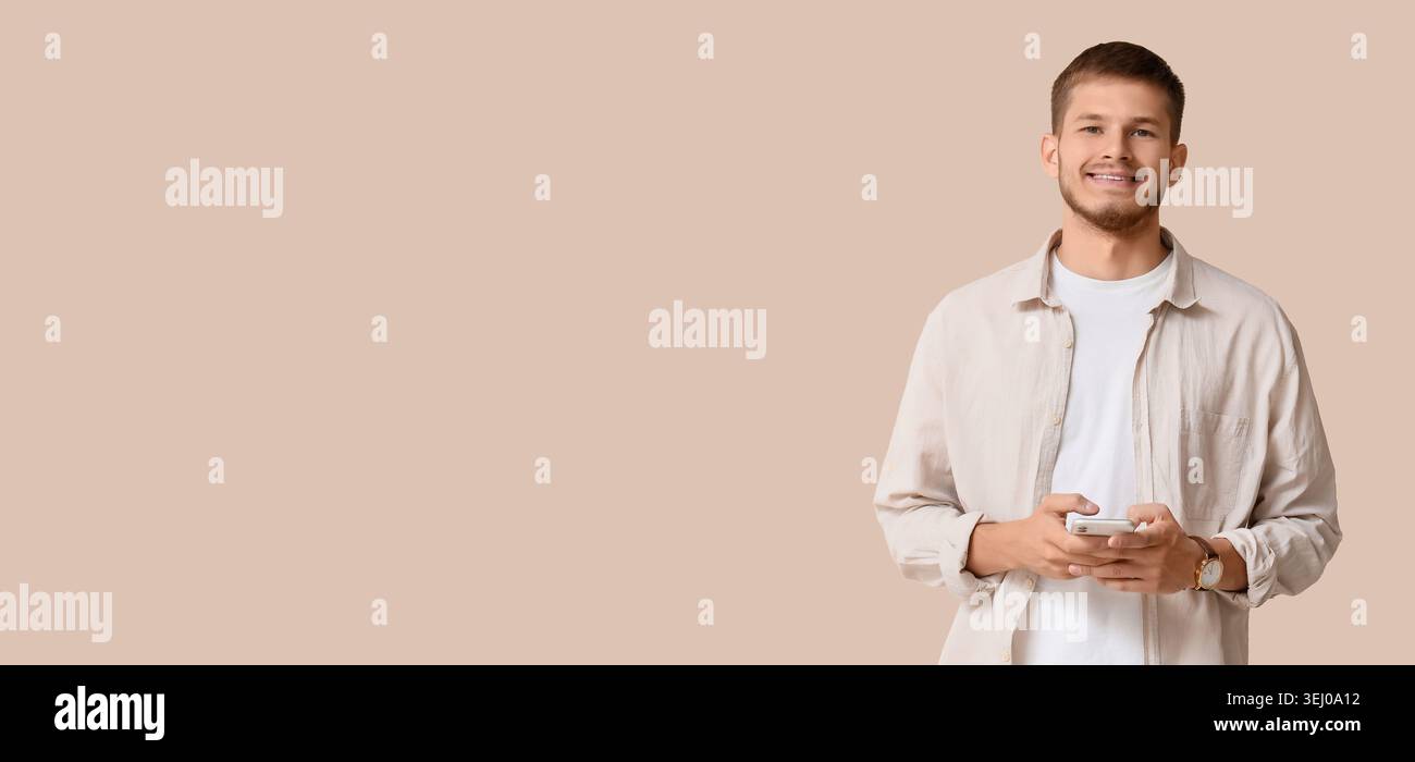 Happy man with mobile phone on beige background with space for text ...