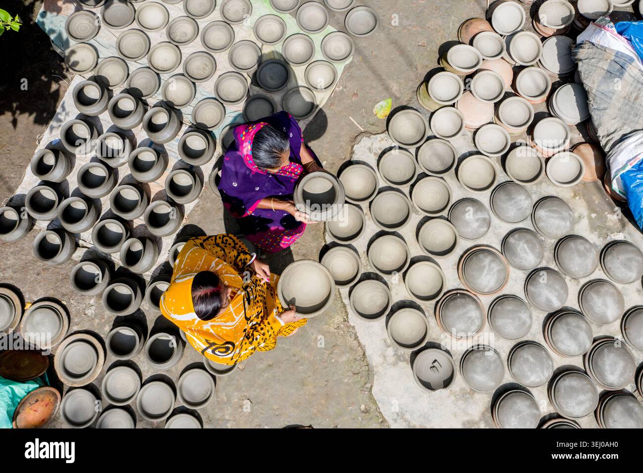 Munshiganj, Bangladesh - 28 September 2021: Aerial view of two women in ...
