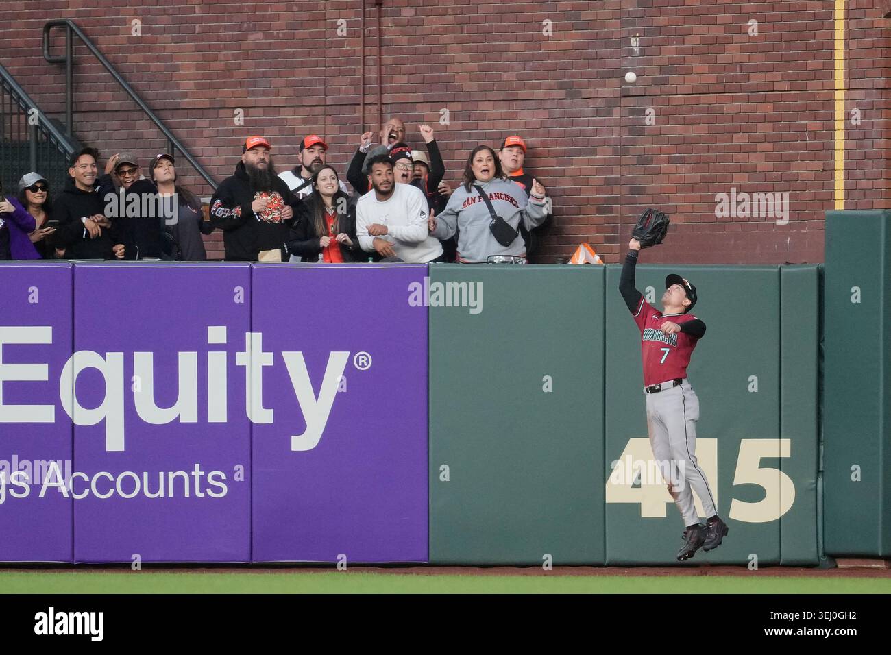 Fans watch as Arizona Diamondbacks right fielder Corbin Carroll catches ...