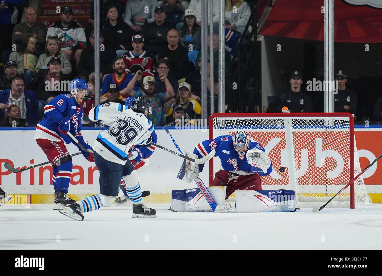 Kitchener Rangers goalie Christian Kirsch (65) stops Chicoutimi ...