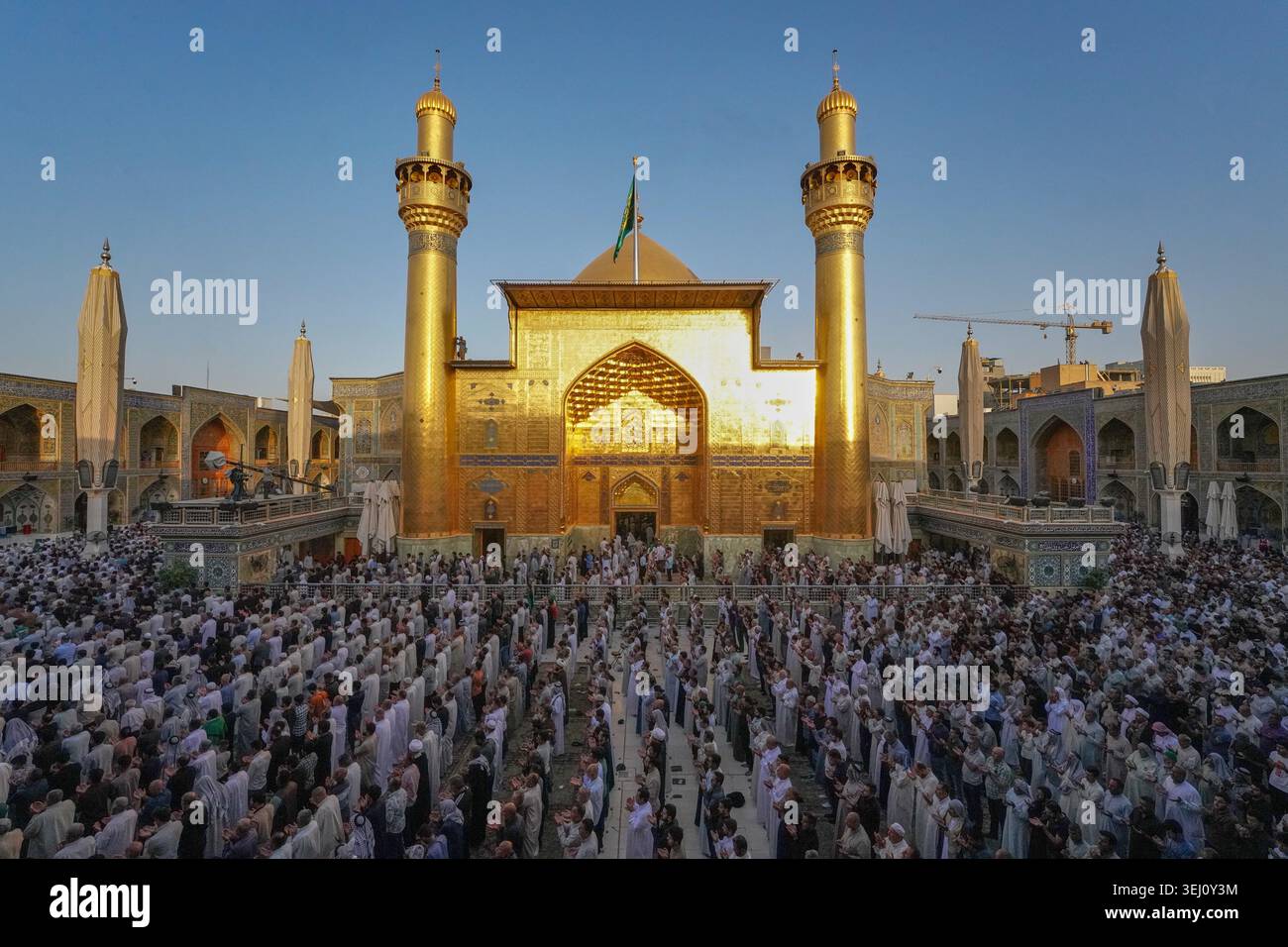 Iraqi Shiite Muslims gather for an Eid al-Adha prayer at the shrine of ...