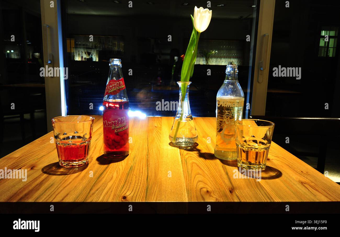 a barkeeper or bartender mixing drinks together in a bar barkeeper ...