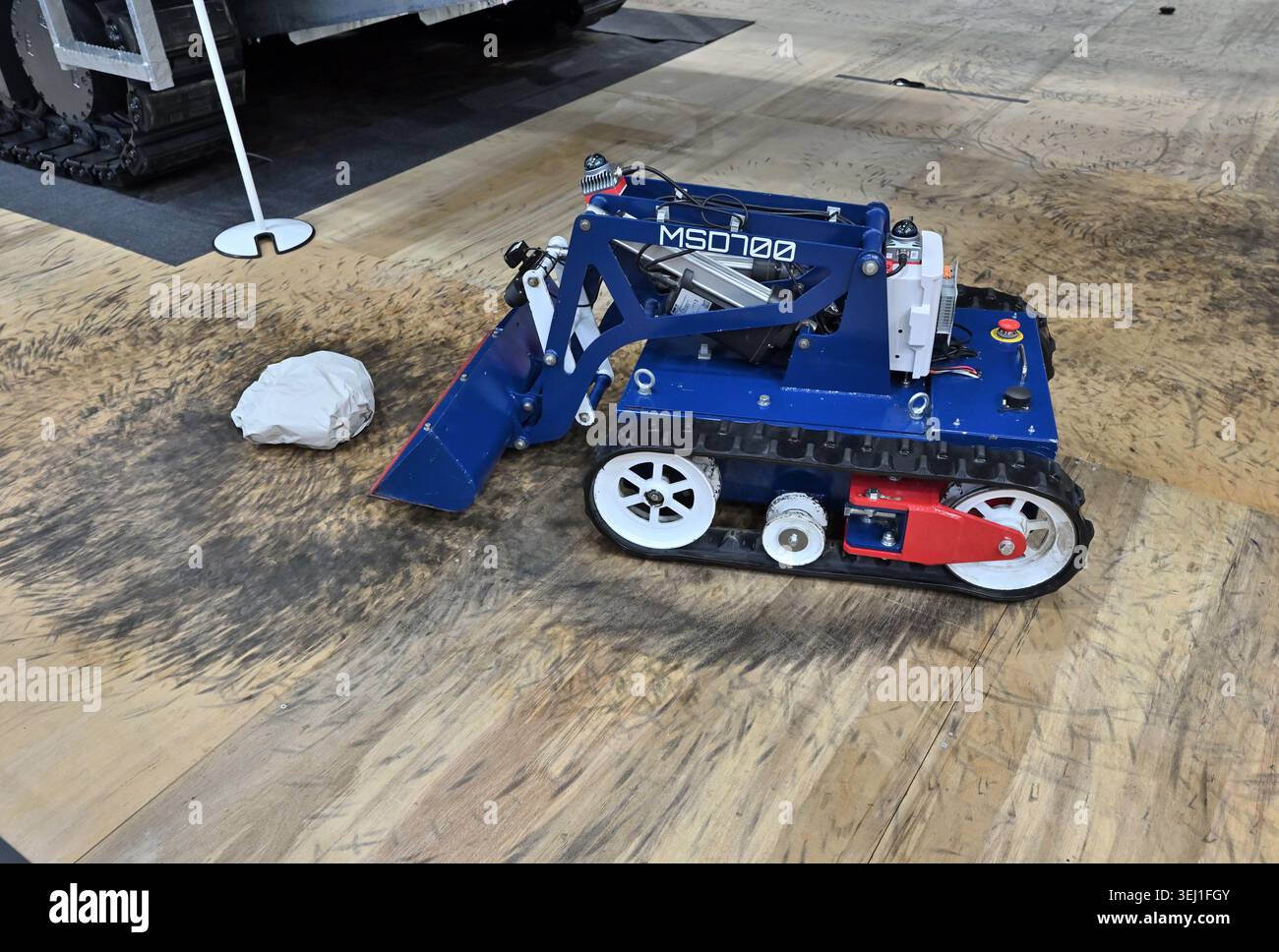 Nakayama Steel Works' ultra-compact construction robot is displayed at ...
