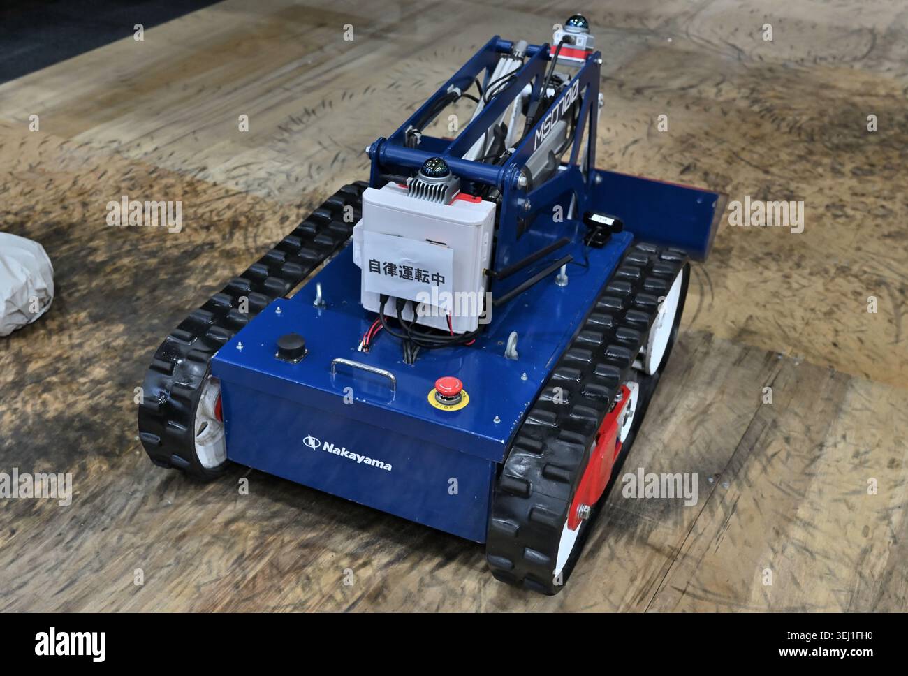 Nakayama Steel Works' ultra-compact construction robot is displayed at ...