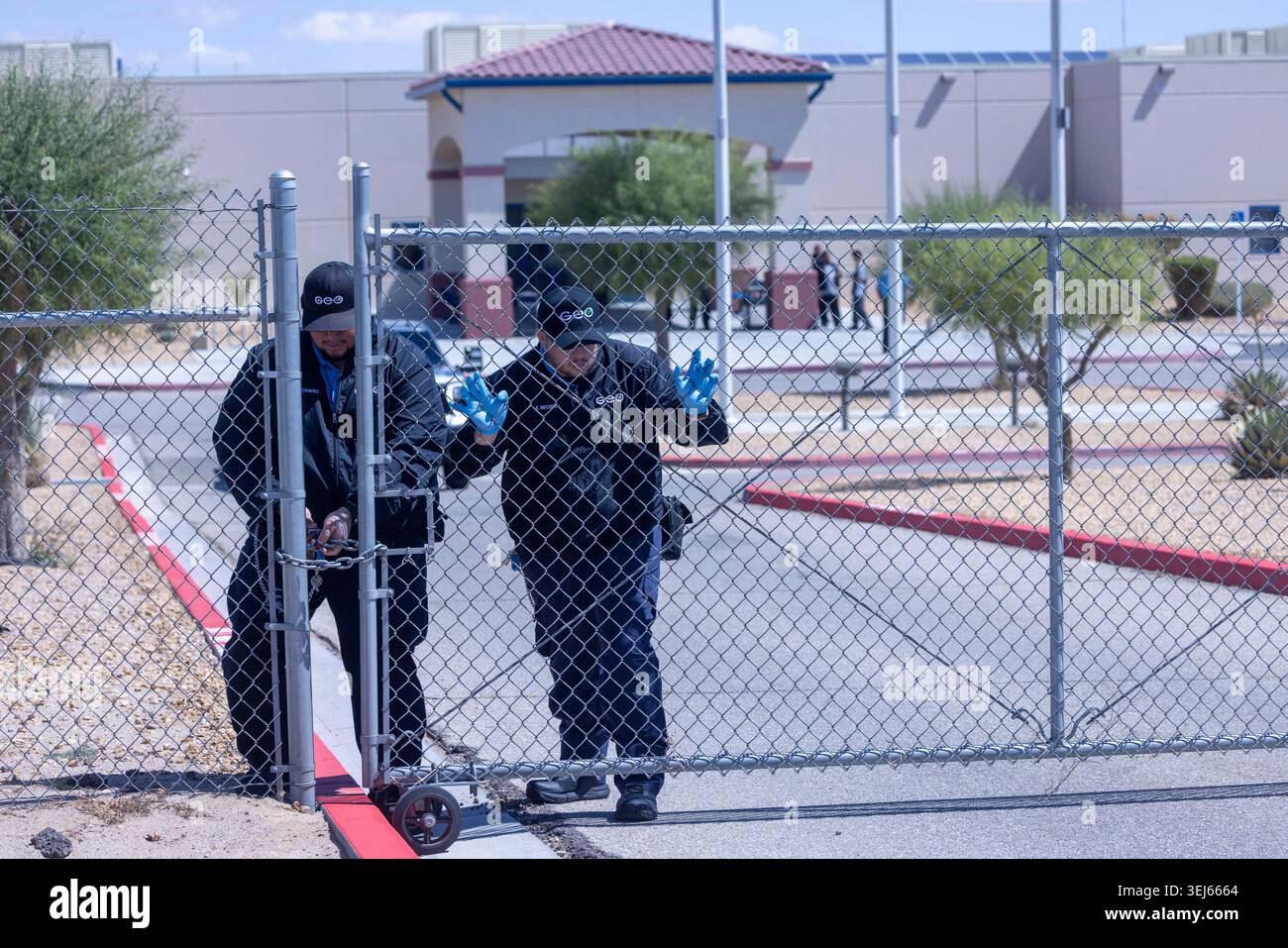Security closes the gate at the Adelanto ICE Processing Center ...