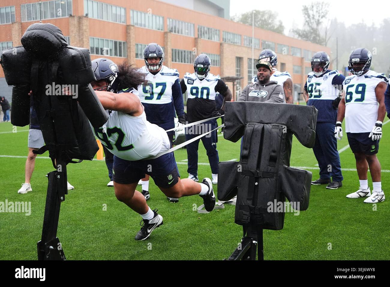 Seattle Seahawks nose tackle Uso Seumalo runs a drill during practice ...