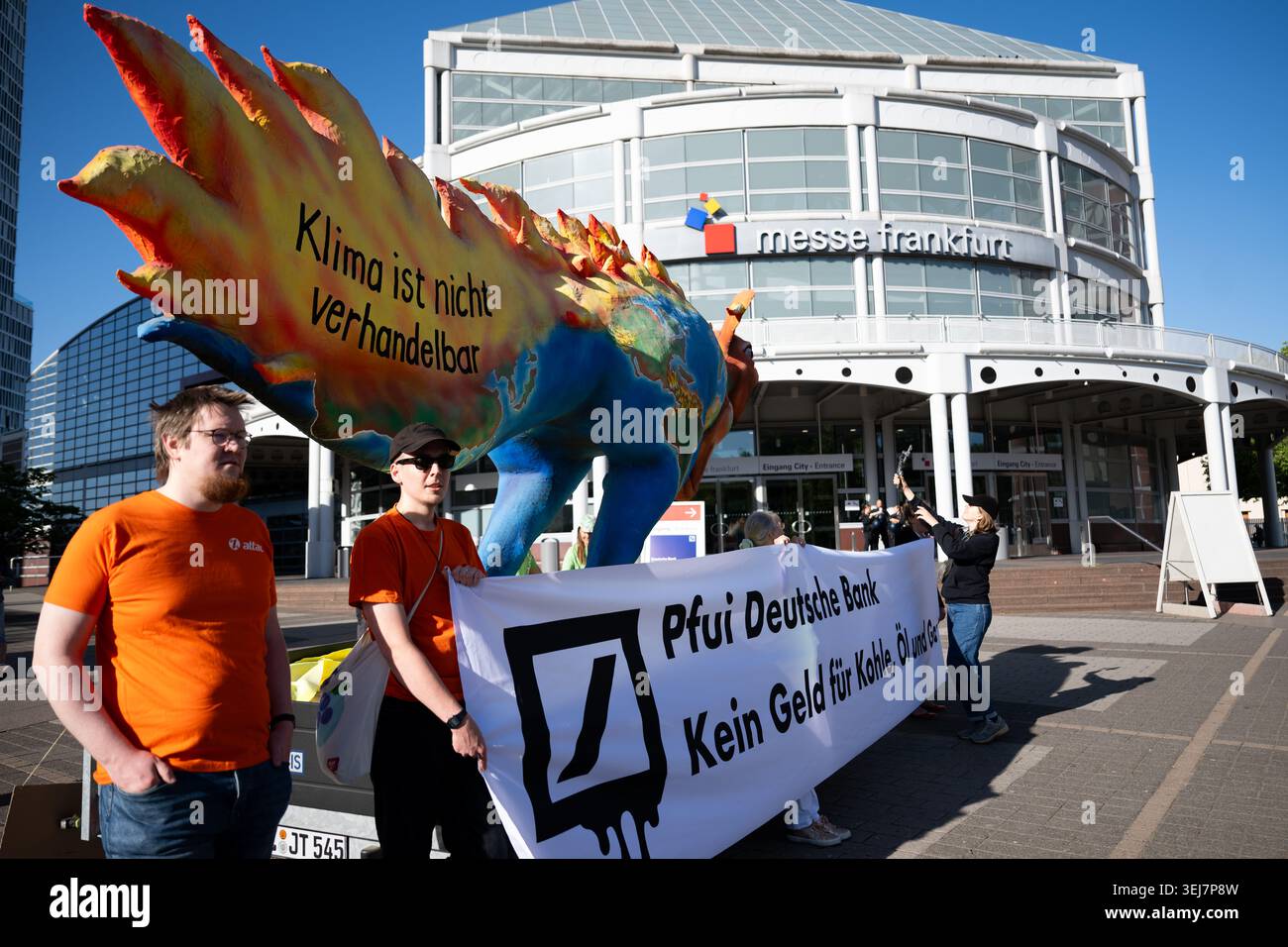 28 May 2026, Hesse, Frankfurt/M.: The Attac movement protests with a ...
