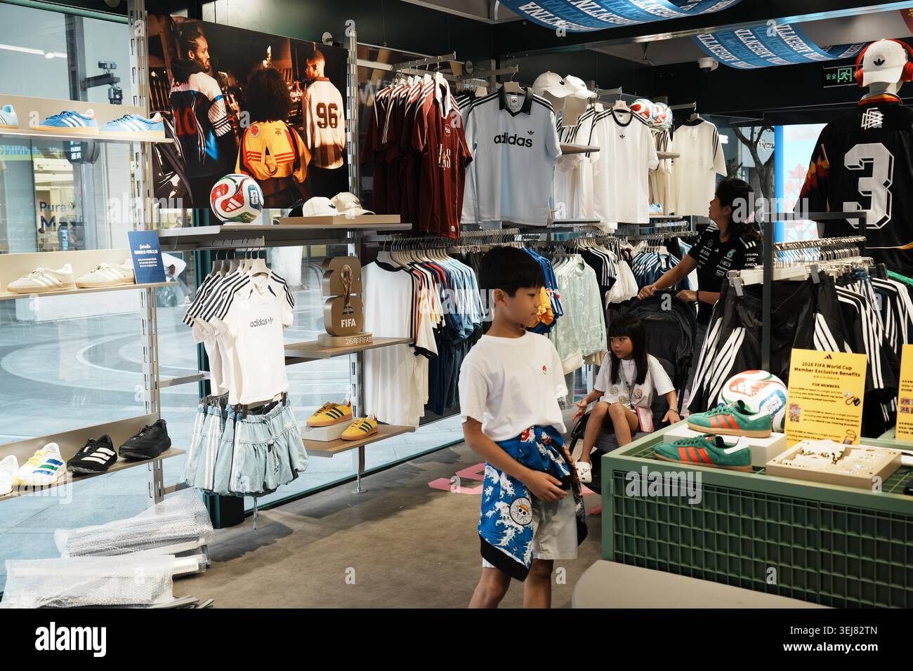 Customers shop for national team jerseys at a 2026 World Cup pop-up ...