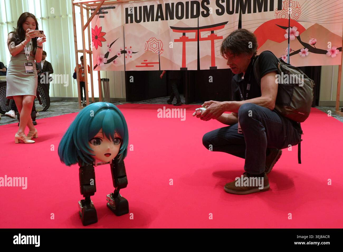 High Torque's Mini Pi bipedal robot is operated at the Humanoids Summit ...