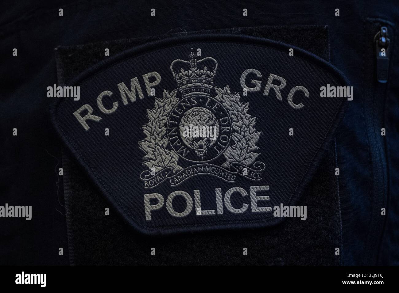 An RCMP patch is worn by an officer at RCMP "E" Division headquarters ...