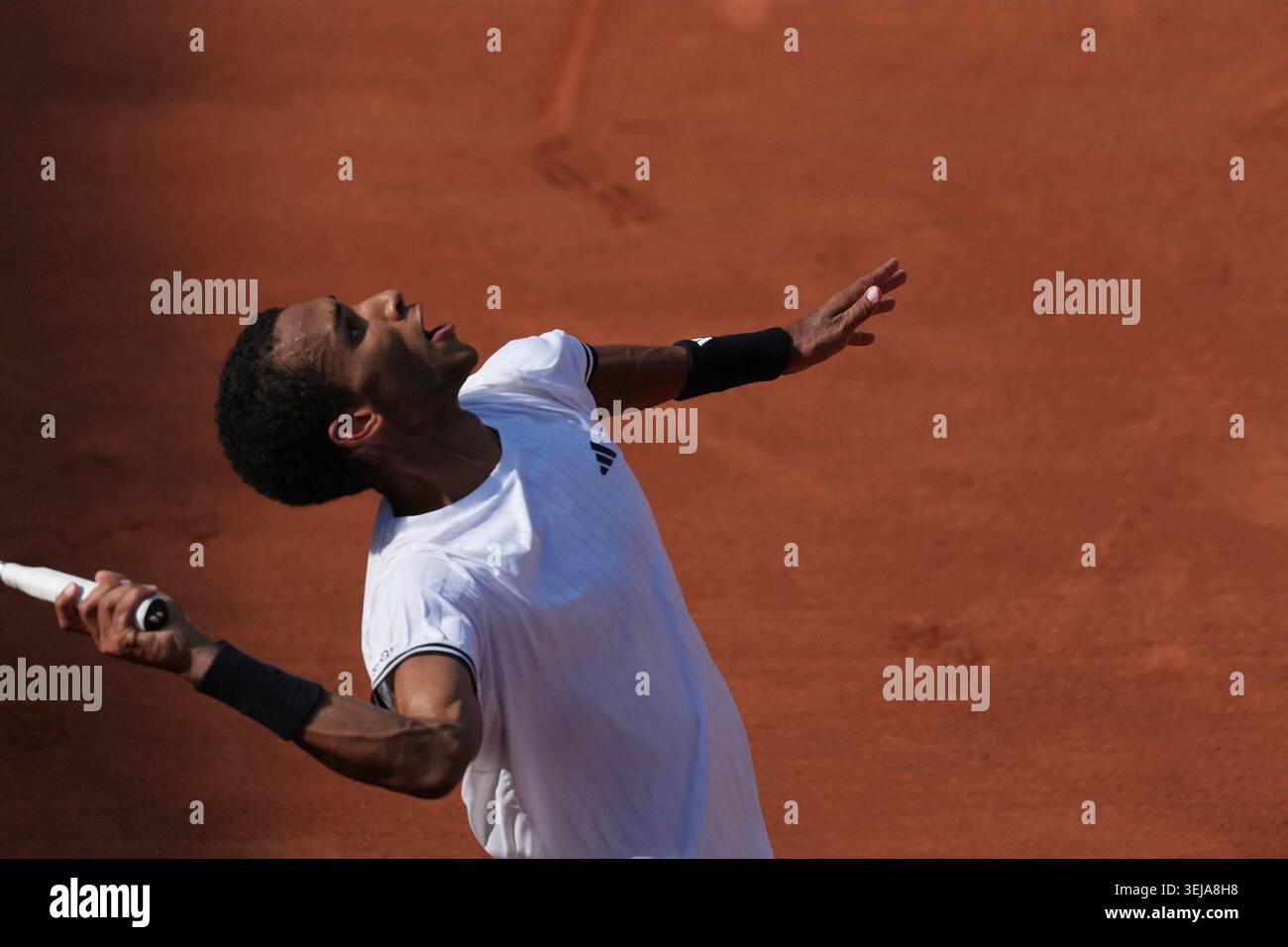 Felix Auger-Aliassime of Canada serves to Roman Andres Burruchaga of ...