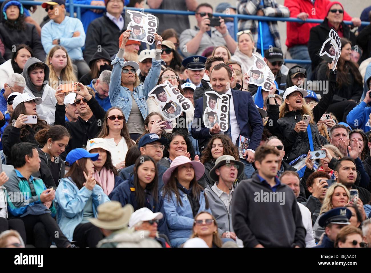 Guests cheer as cadets receive diplomas during the United States Air ...