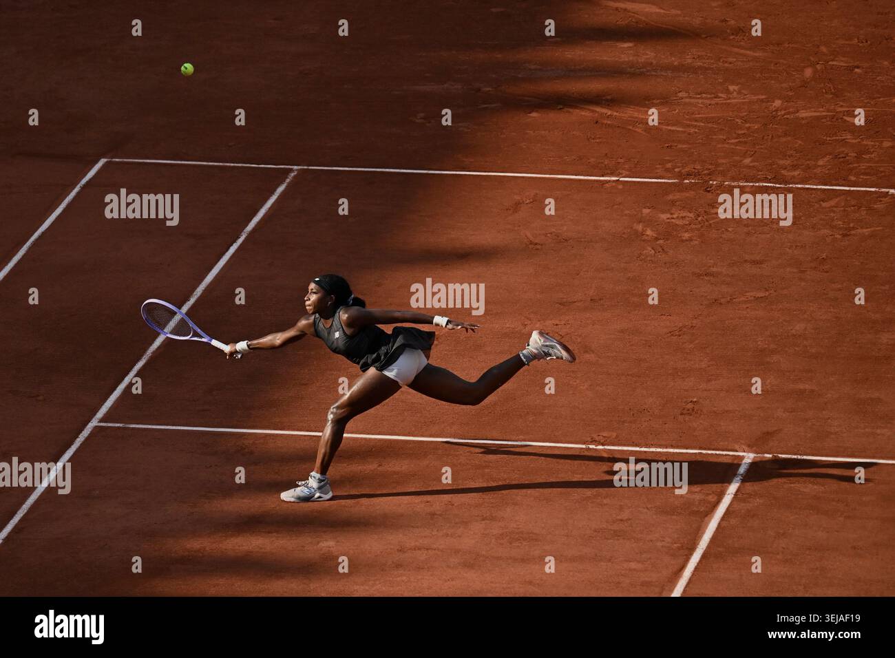 Coco Gauff of the U.S. returns to Mayar Sherif of Egypt during their ...