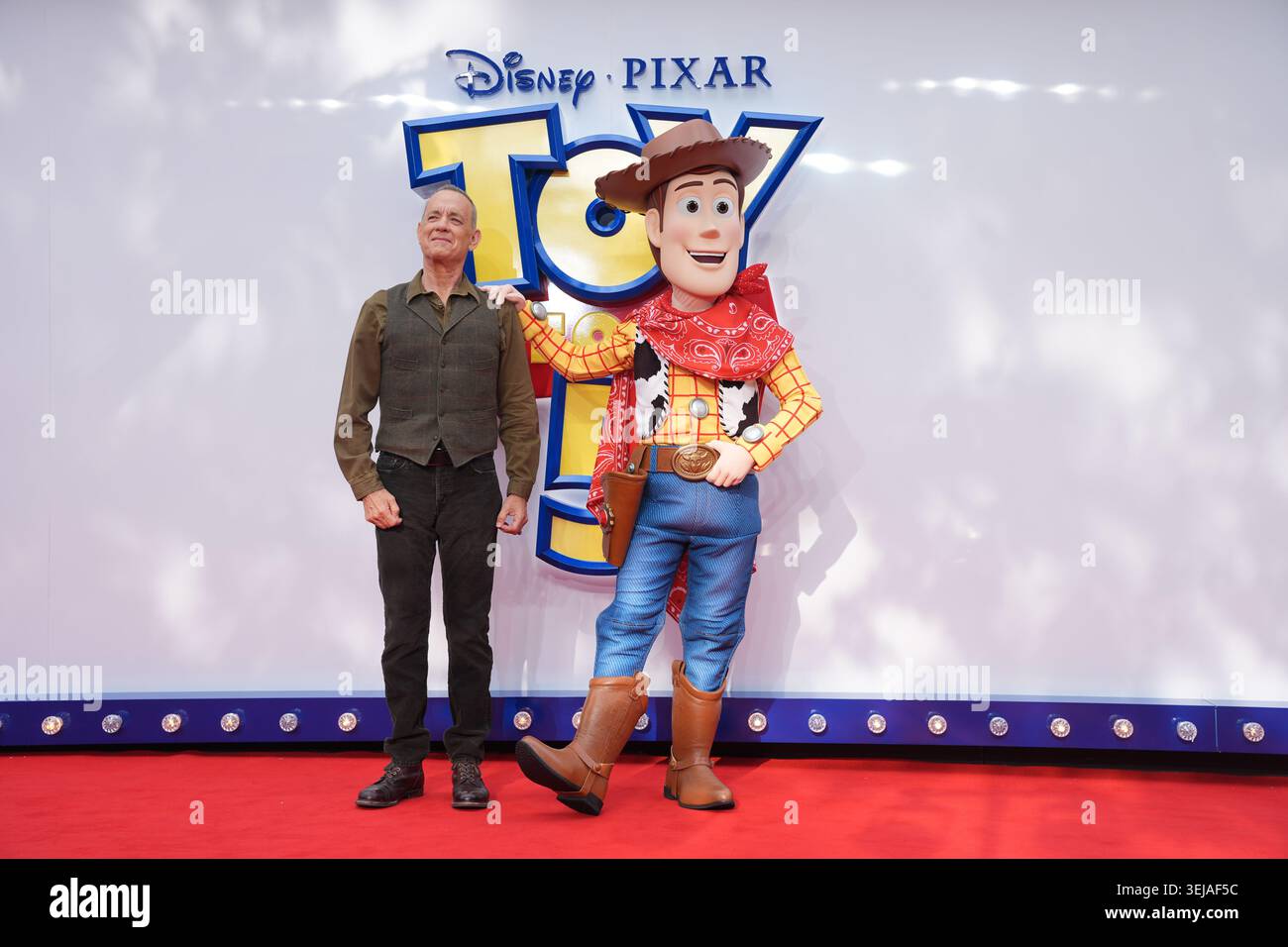 Tom Hanks (left) and Toy Story character Woody at a launch event for ...