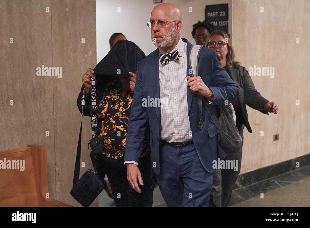 Arnold Levine, defense attorney for Randy Santos, leaves court after ...