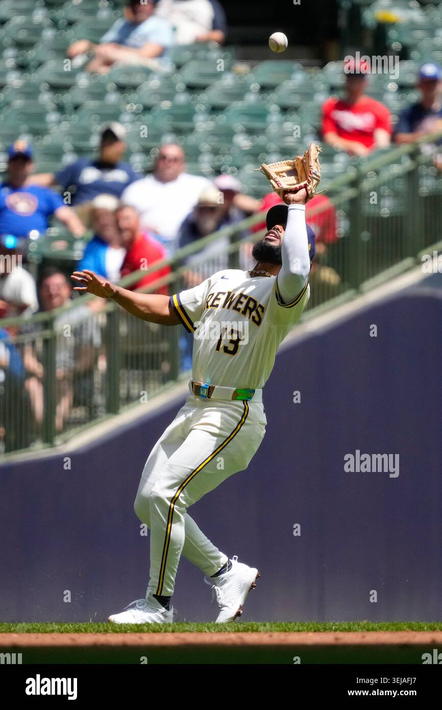 Milwaukee Brewers third baseman Luis Rengifo catches a fly ball hit by ...