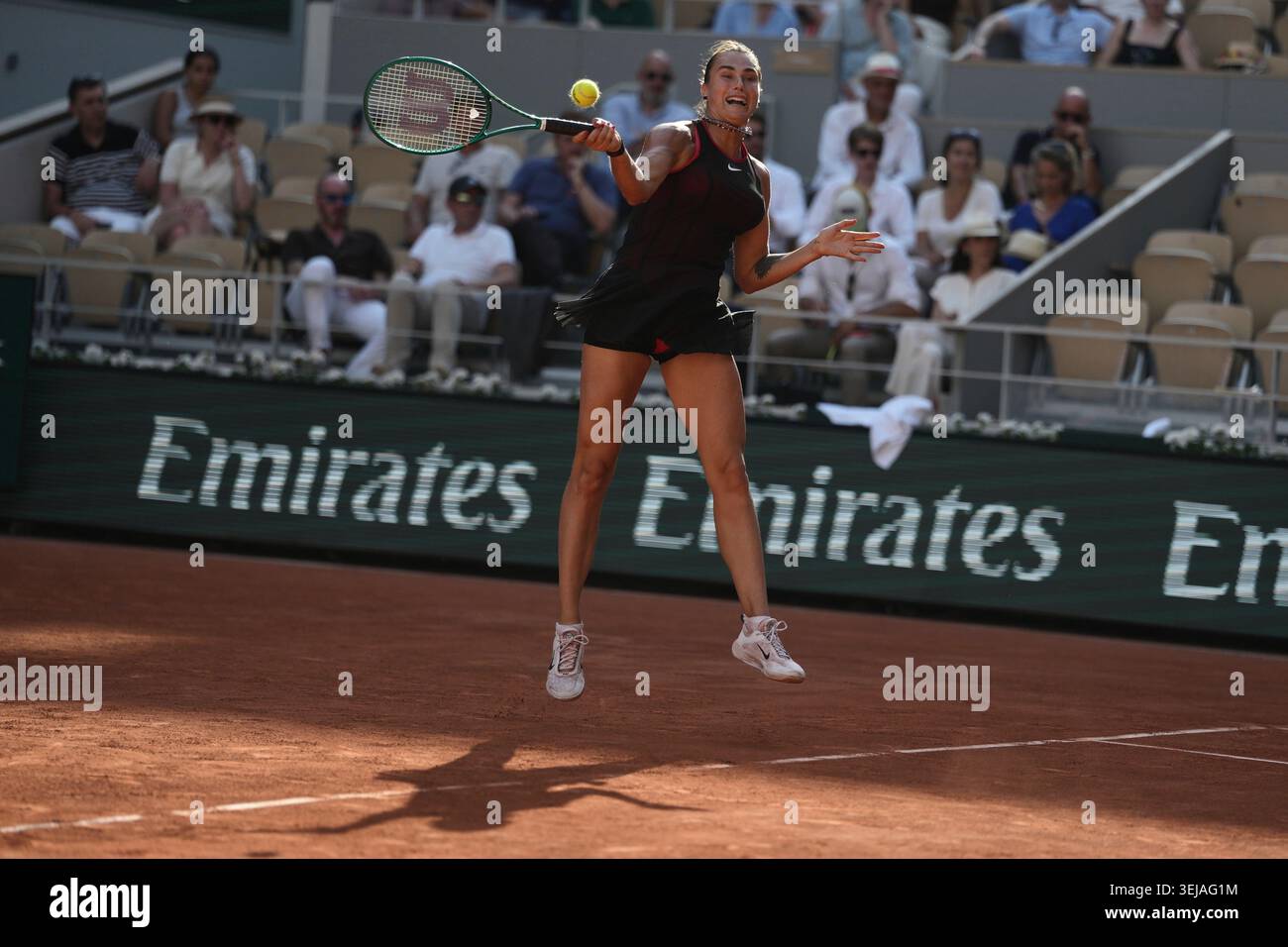 Aryna Sabalenka of Belarus returns to Elsa Jacquemot of France during ...