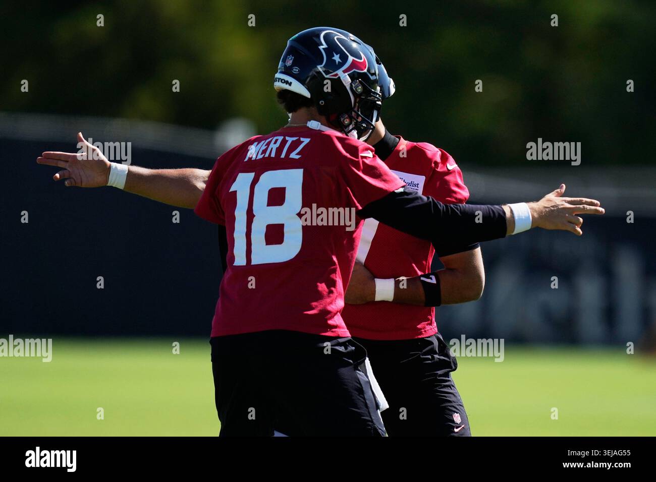 Houston Texans quarterback C.J. Stroud (7) greets quarterback Graham ...