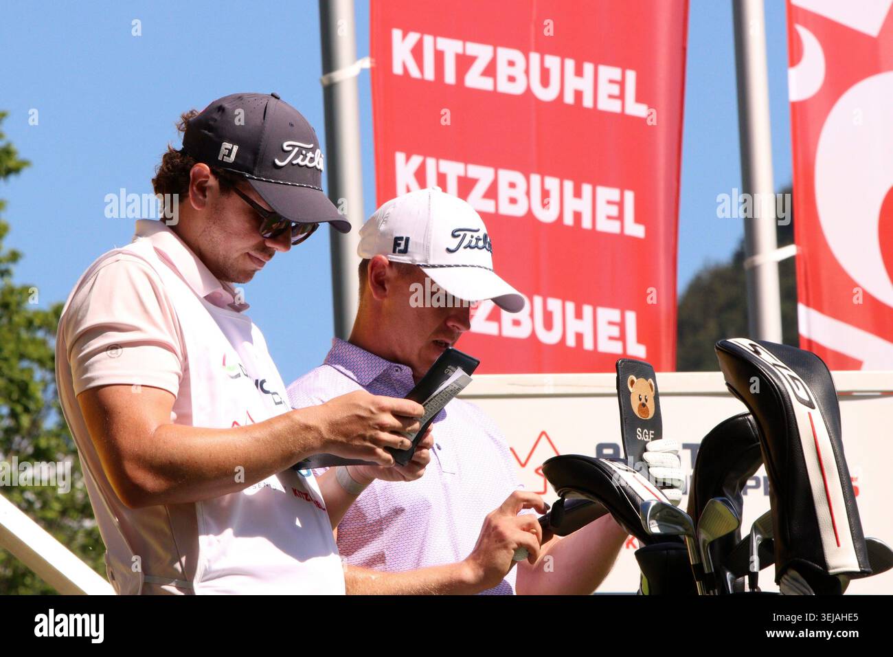 KITZBUEHEL, AUSTRIA - MAY 28: Caddy and player checking stats on a Tee ...
