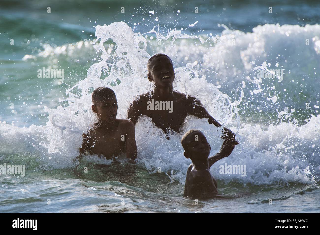 Palestinian citizens of Israel enjoy the waves of the Mediterranean Sea ...