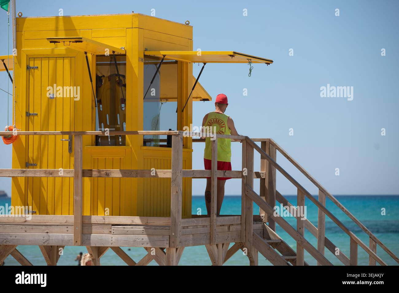 28 May 2026, Spain, Palma de Mallorca: A lifeguard at his watchtower on ...