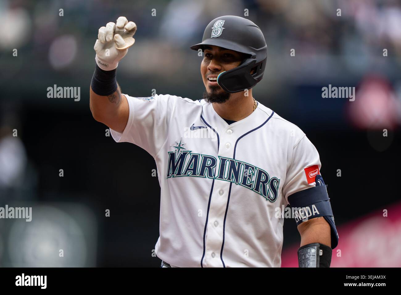 Seattle Mariners' Jhonny Pereda celebrates a hit during a baseball game ...
