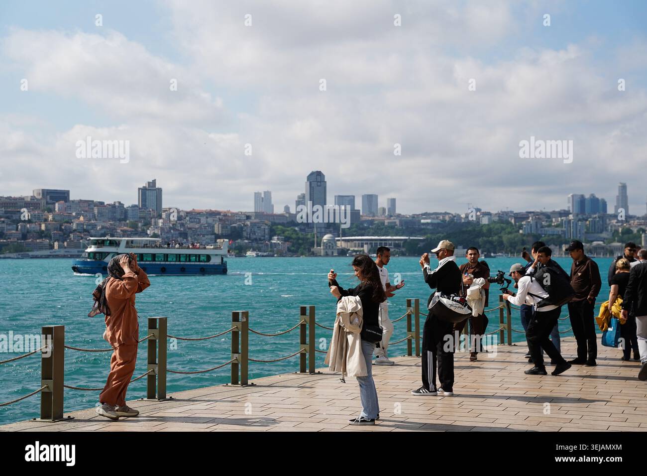 May 24, 2026, Istanbul, Turkey: People walk along the coast of Uskudar ...