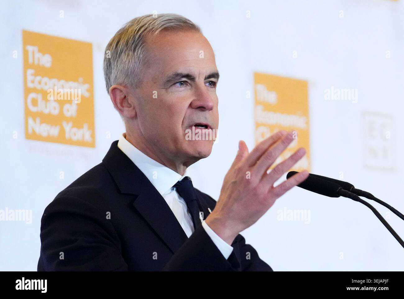 Canadian Prime Minister Mark Carney delivers a speech and takes part in ...