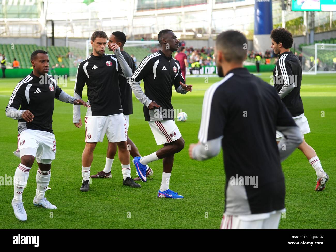 Qatar players warming up ahead of an international friendly match at ...