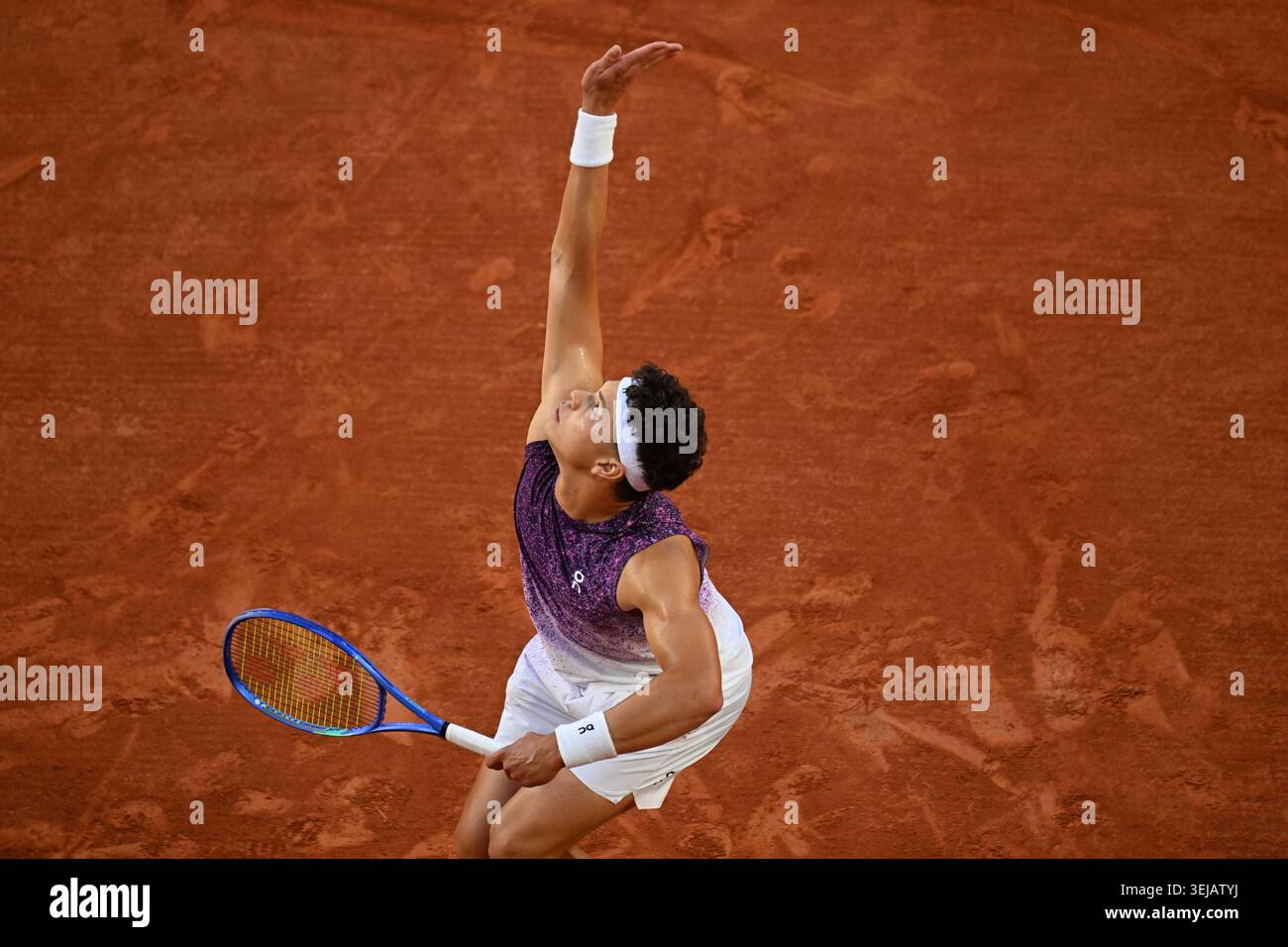 Ben Shelton of the U.S. serves to Raphael Collignon of Belgium during ...