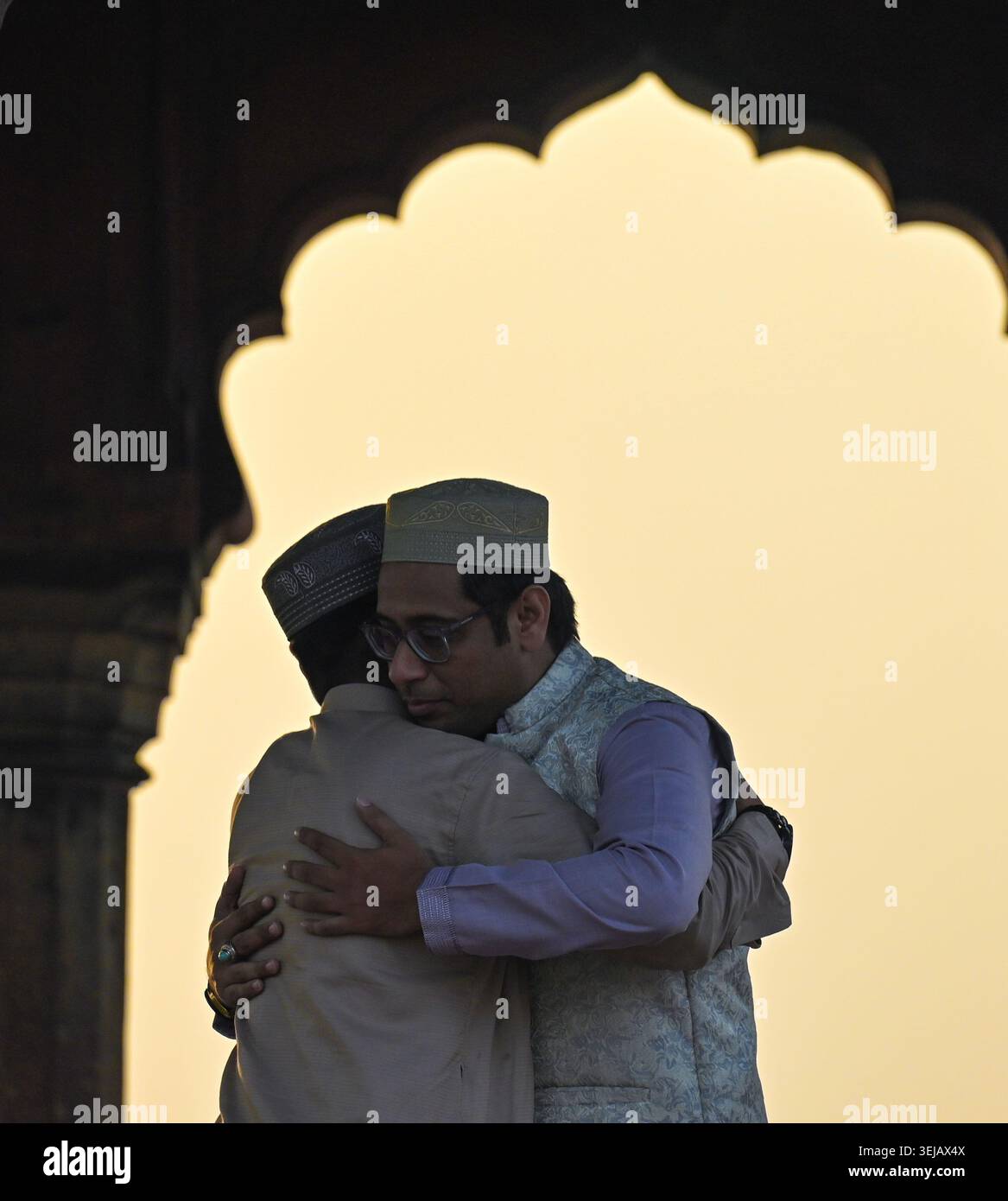 NEW DELHI, INDIA - MAY 28: Muslim hug each other after congregational ...