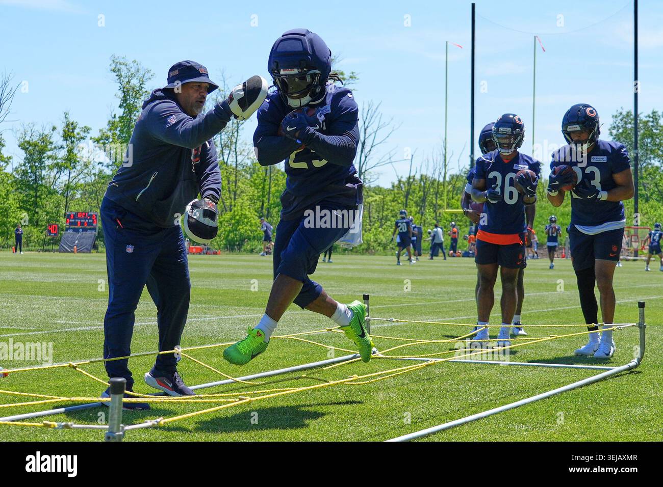 Chicago Bears running back Kyle Monangai (25) works with running backs ...